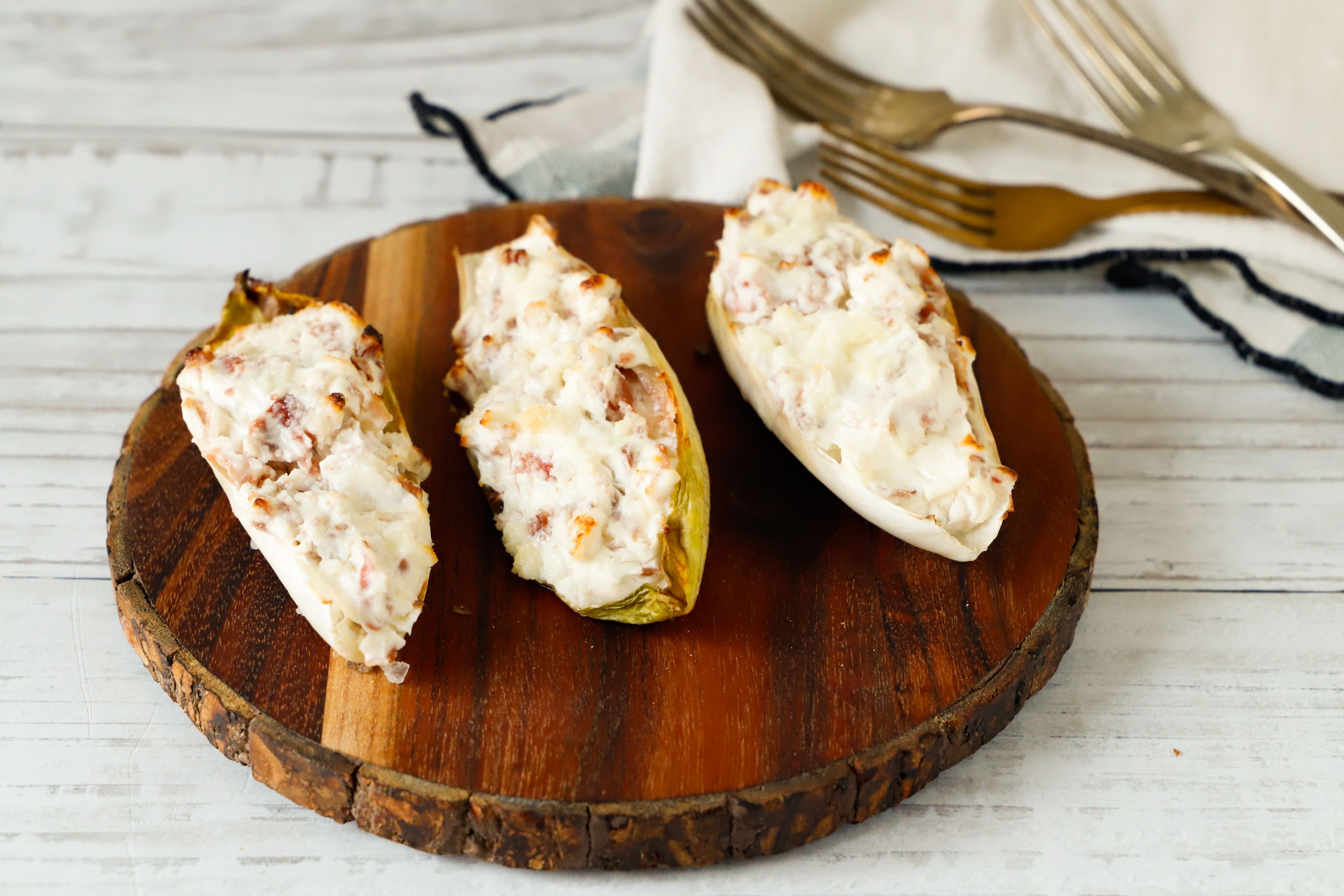 Barchette di indivia al forno con speck | Conad